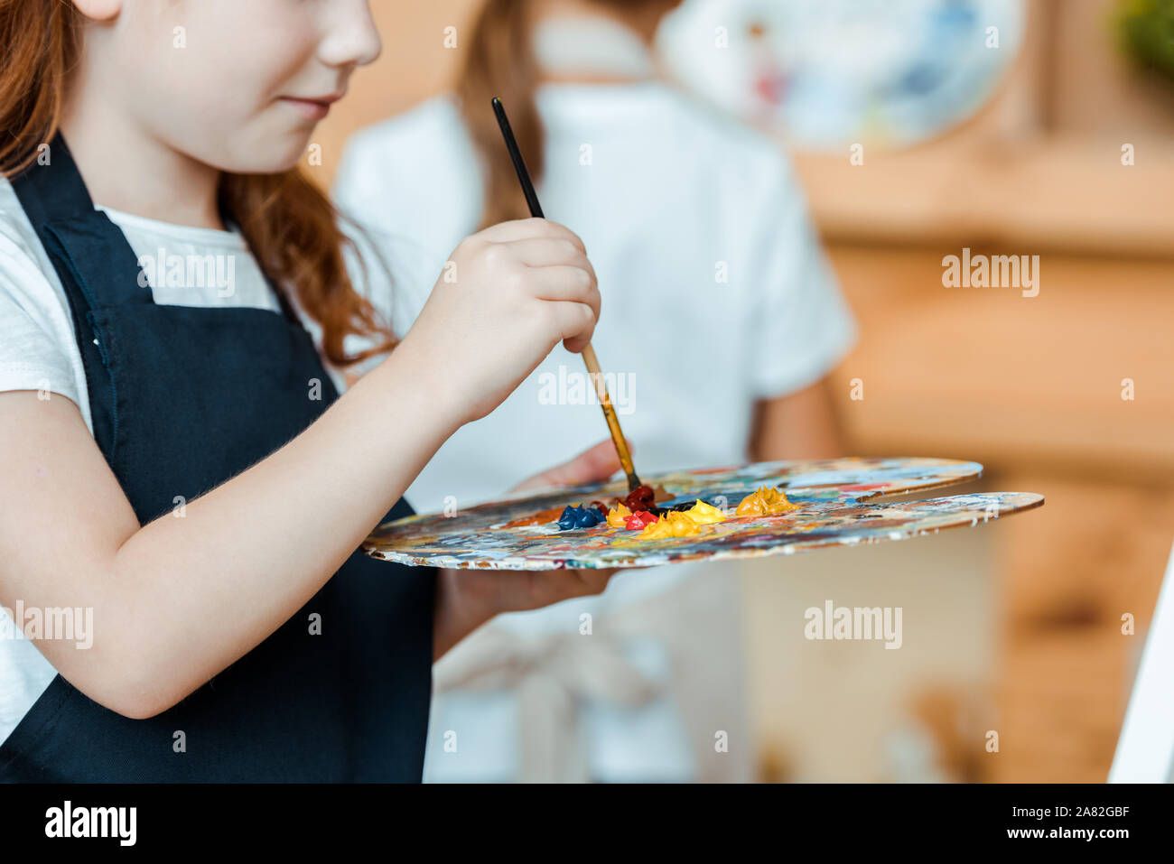 Children hold paint class hi-res stock photography and images - Alamy
