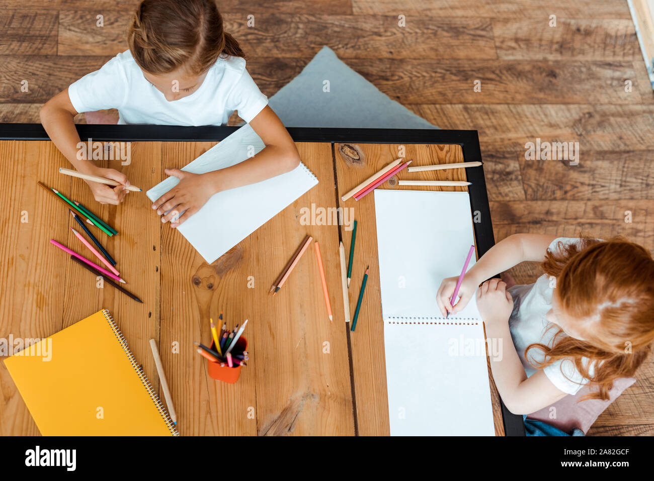 Two kids drawing on hi-res stock photography and images - Alamy
