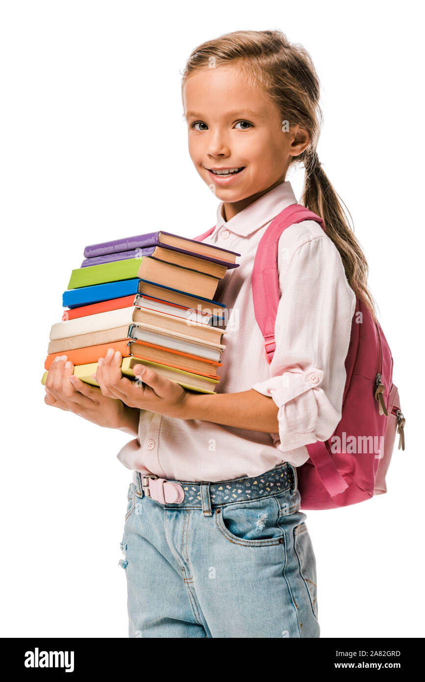 smiling schoolkid holding colorful books isolated on white Stock Photo ...