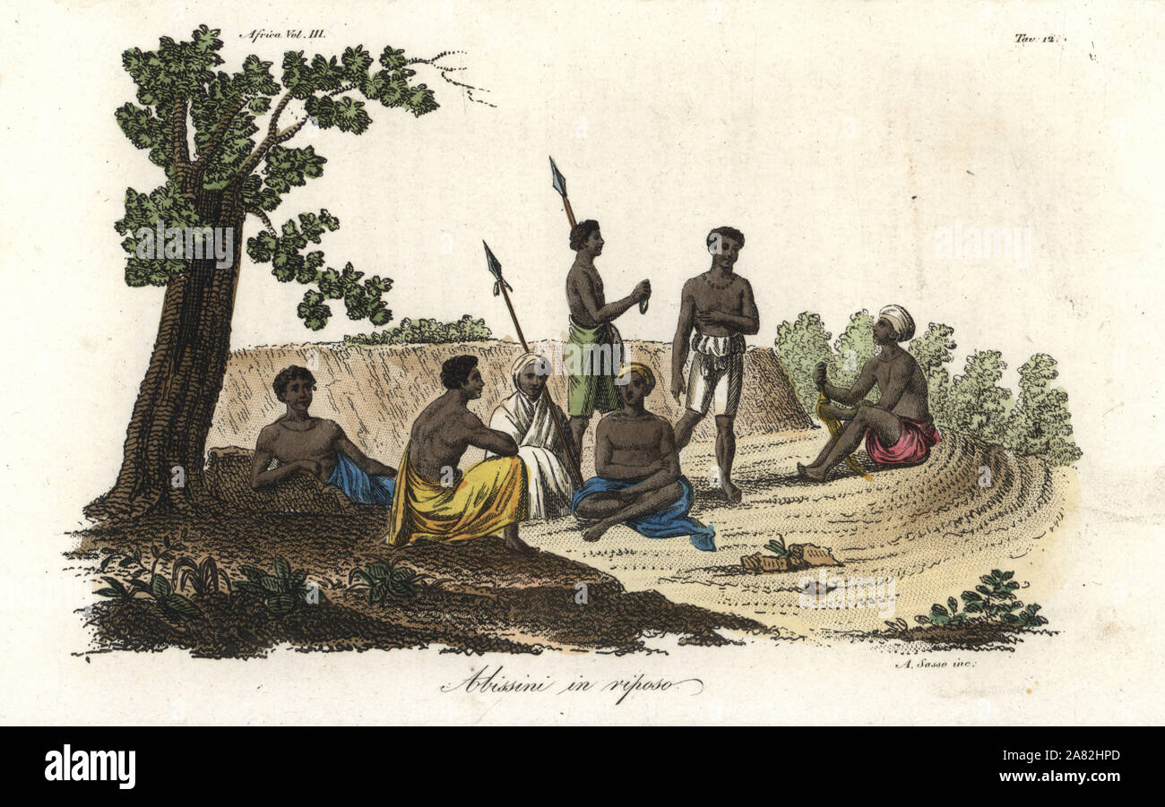 Abyssinians relaxing with Nathaniel Pierce (in yellow skirt), a British ...