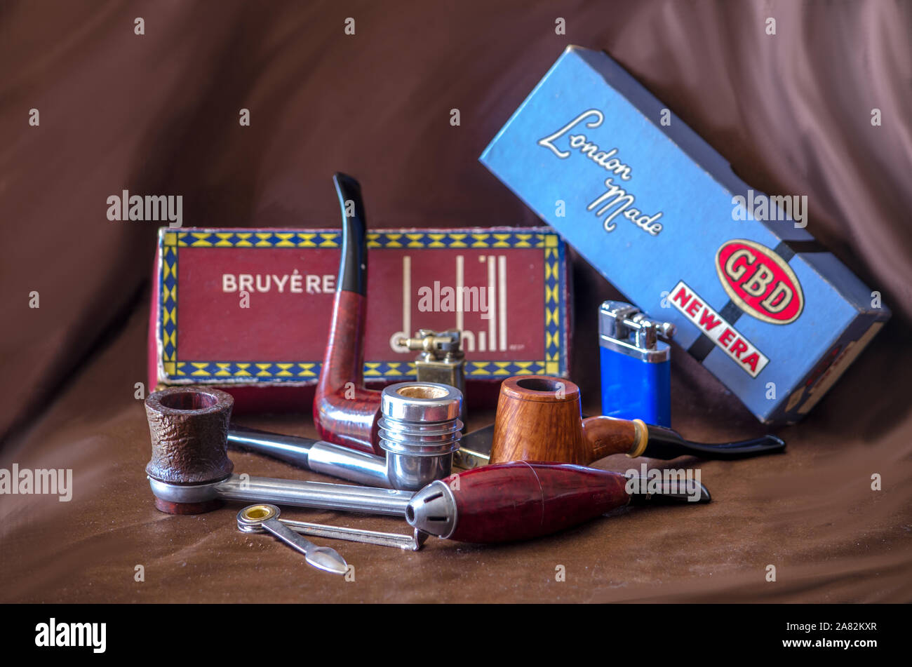 Still life of a pipe collector, with special pipes, tools and antique ...