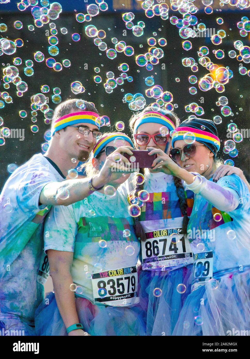 Colorful group selfie with bubbles Stock Photo - Alamy