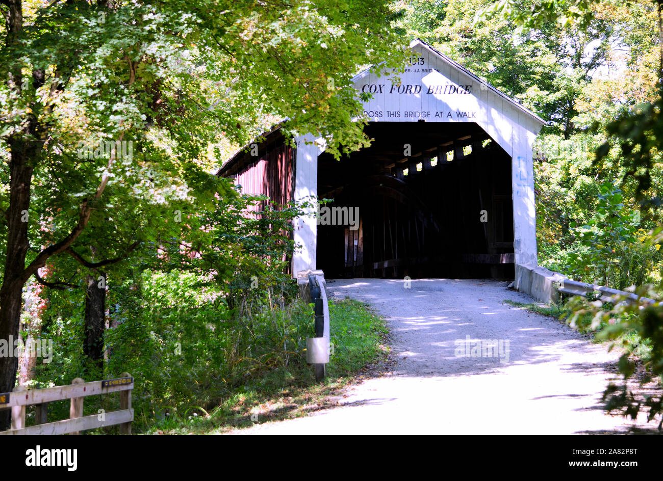 A nostalgic covered bridge in southern Indiana, called the cox ford ...
