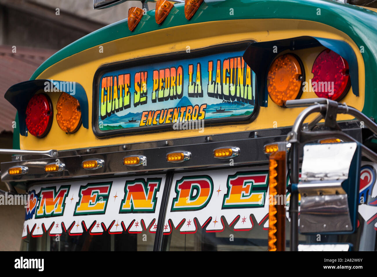 Detail photo of the front of a brightly painted public transport ...
