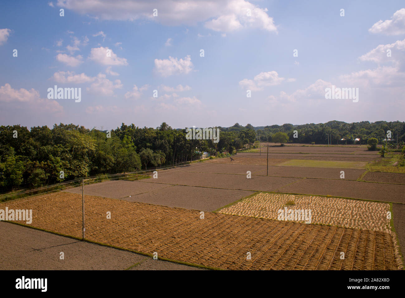 Aerial and landscape view from the flyover or a bridge, Farmland after ...
