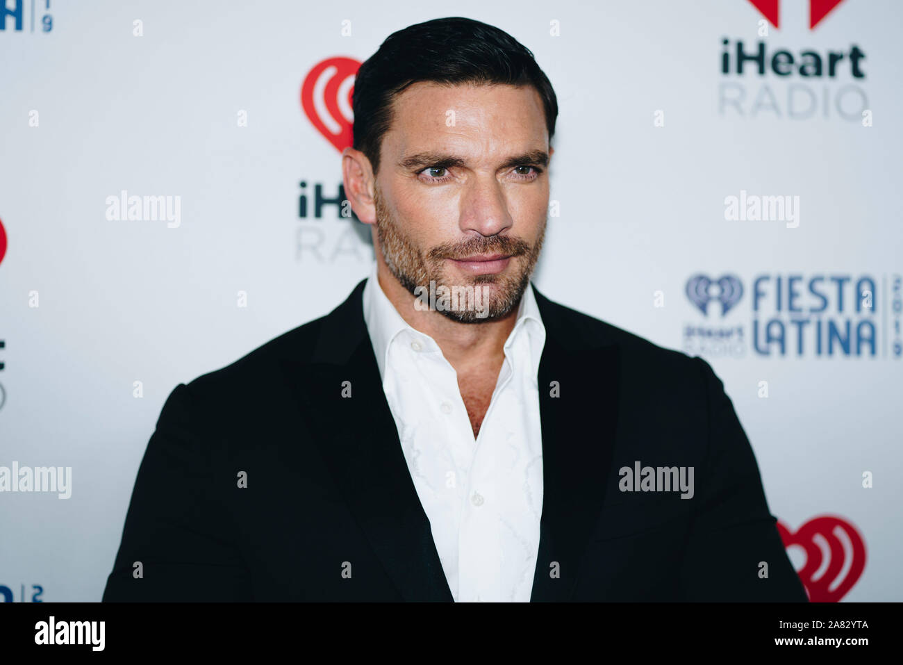 Julian Gil on the red carpet at the iHeartRadio Fiesta Latina 2019 at ...