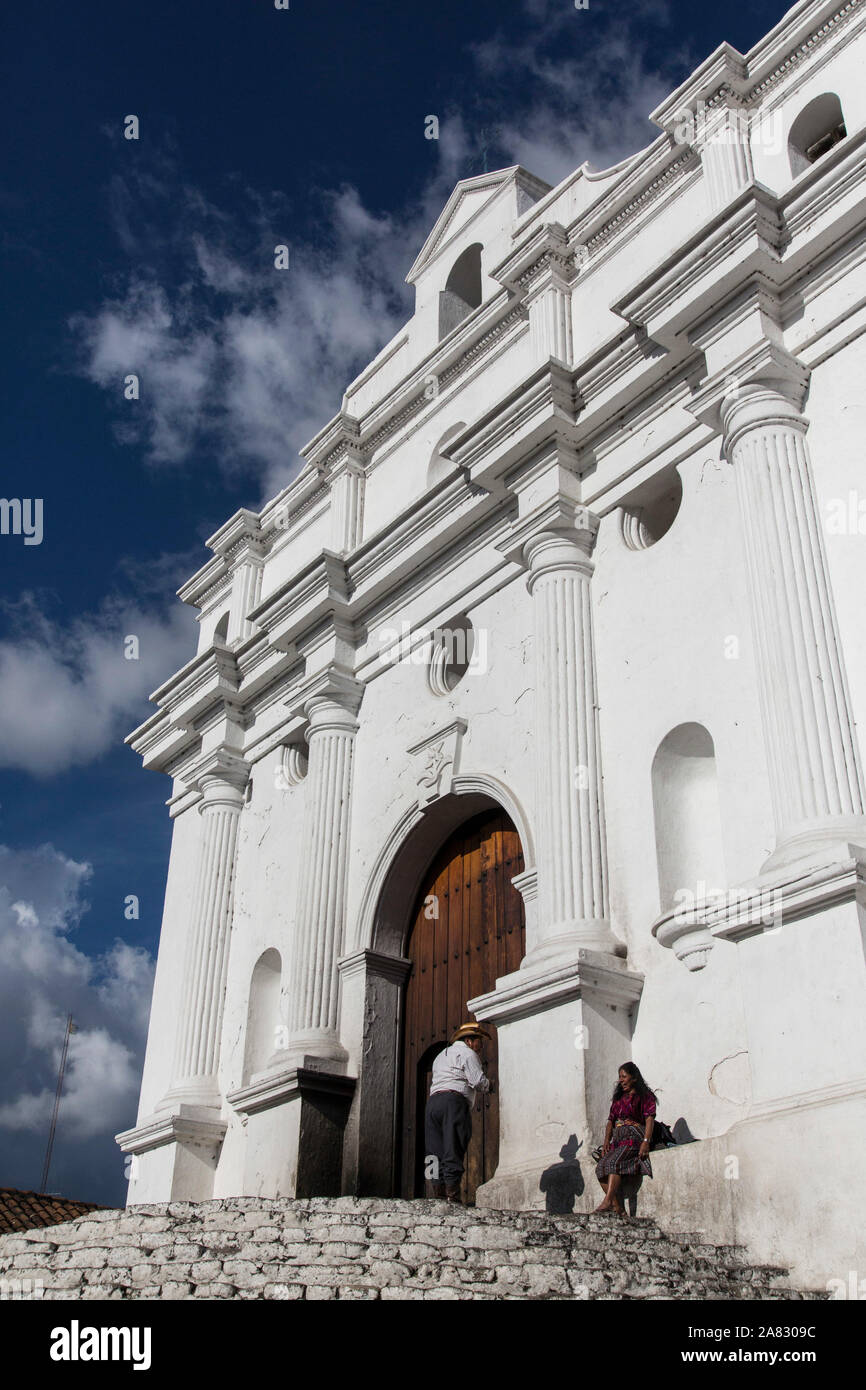 A man and a woman in front of the Church of Santo Tomas in ...