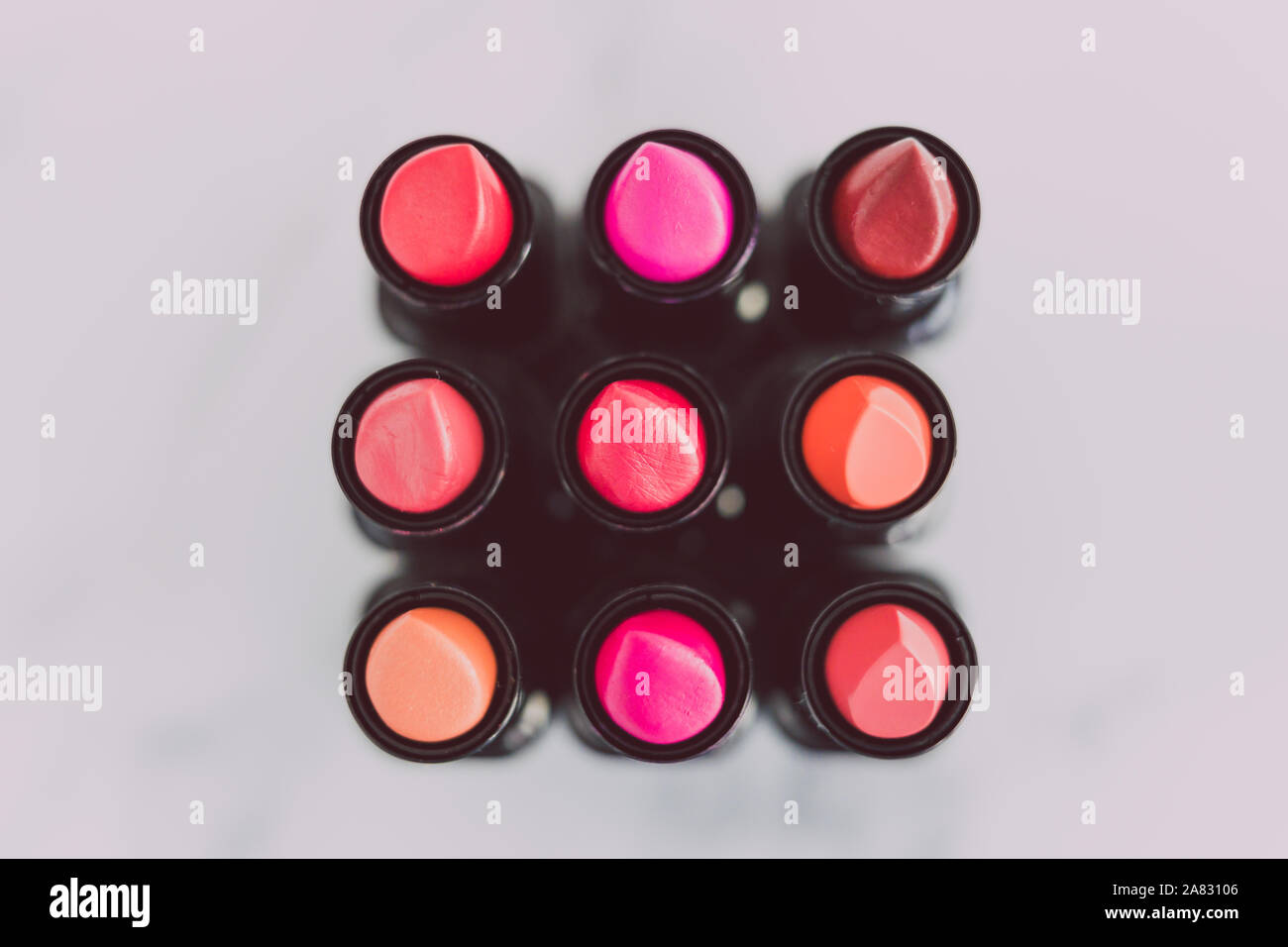 make-up and beauty industry still-life with group of colorful lipsticks ...