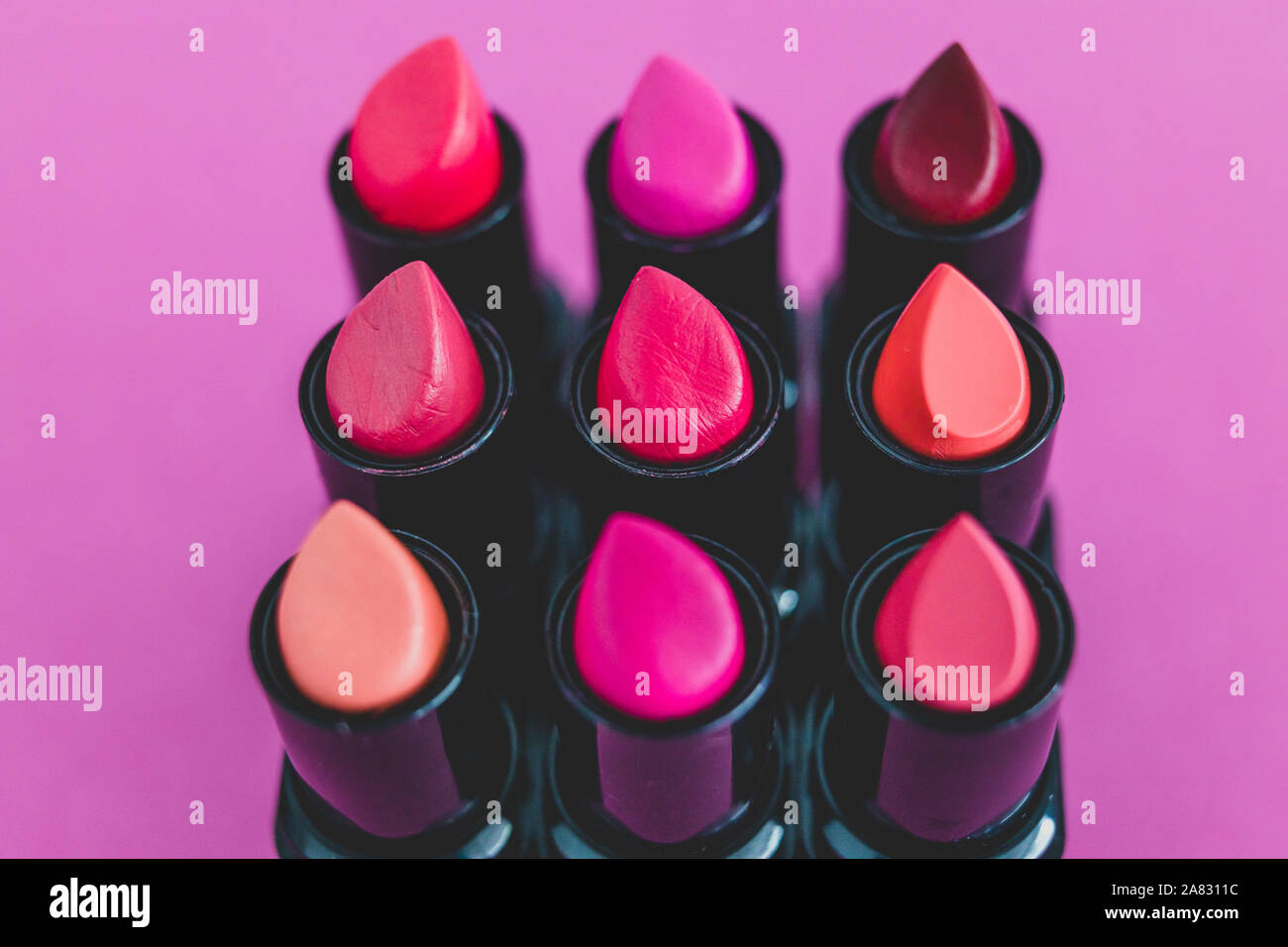 make-up and beauty industry still-life with group of colorful lipsticks ...