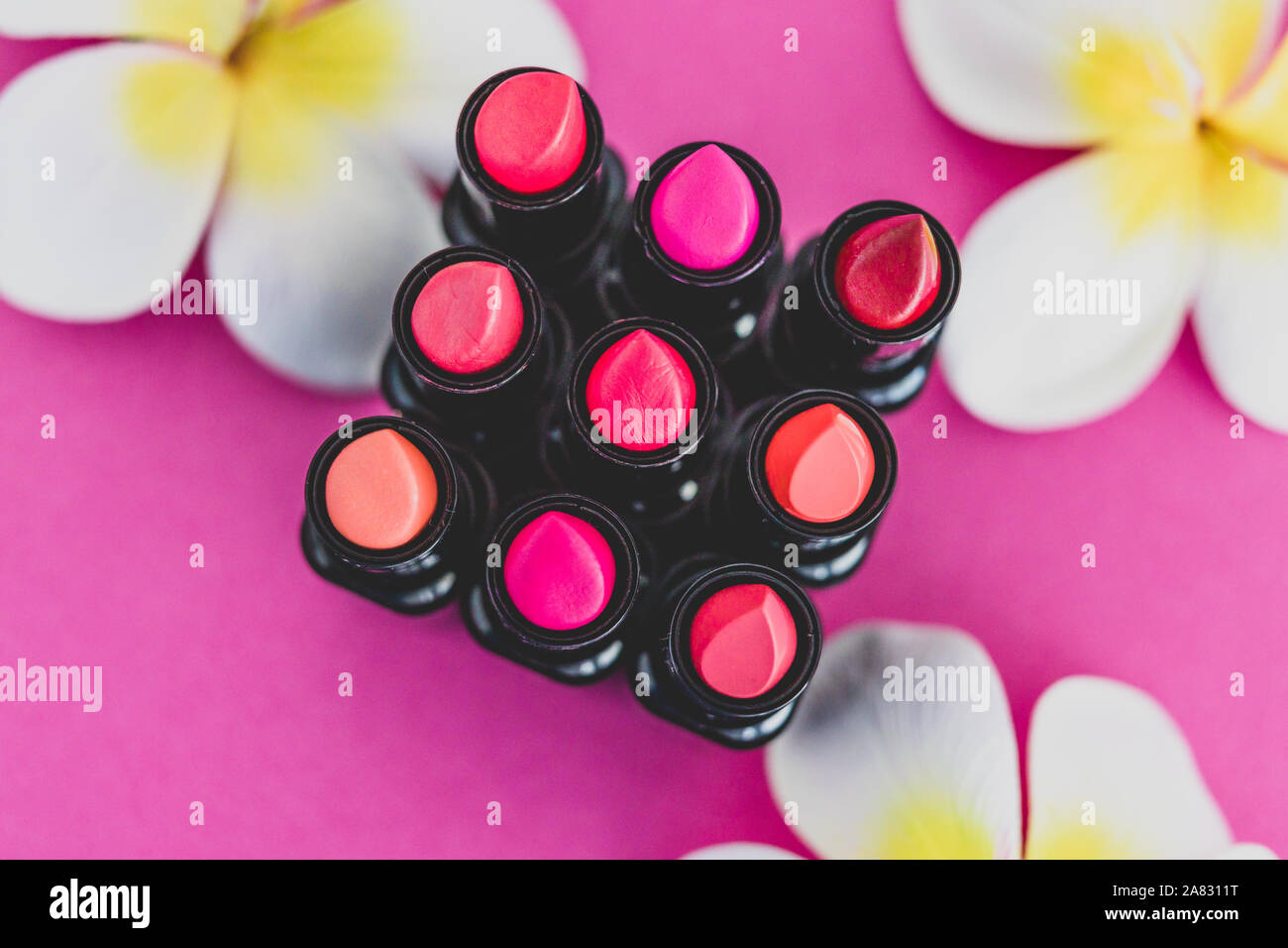 make-up and beauty industry still-life with group of colorful lipsticks ...