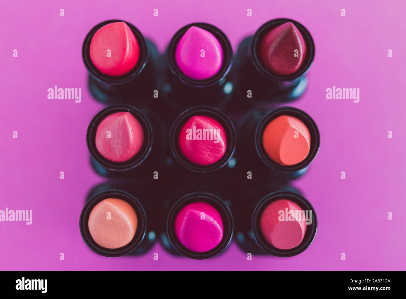 make-up and beauty industry still-life with group of colorful lipsticks ...