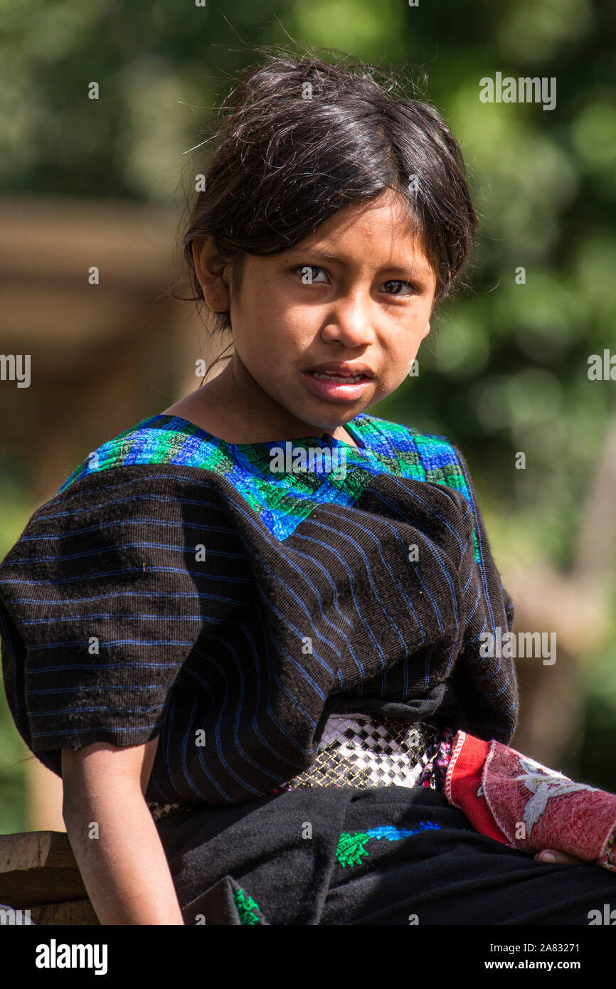 Natural-light portrait of a young Mayan girl in traditional dress in ...