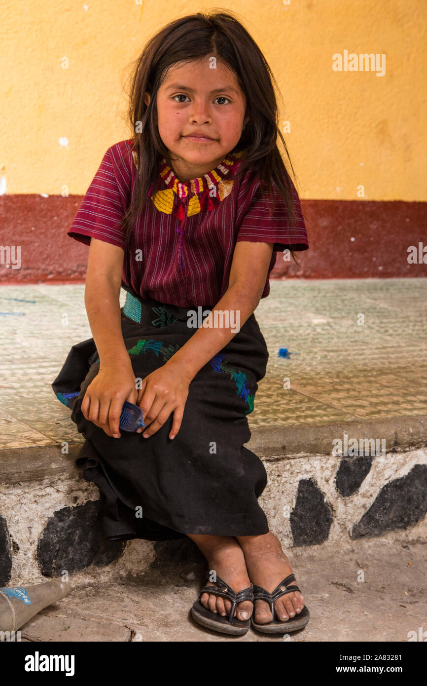 Portrait of a young Mayan girl, about age 10 years, in traditional ...
