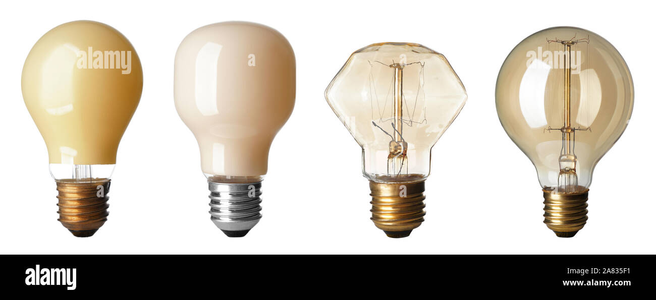 Different light bulbs on white background Stock Photo - Alamy