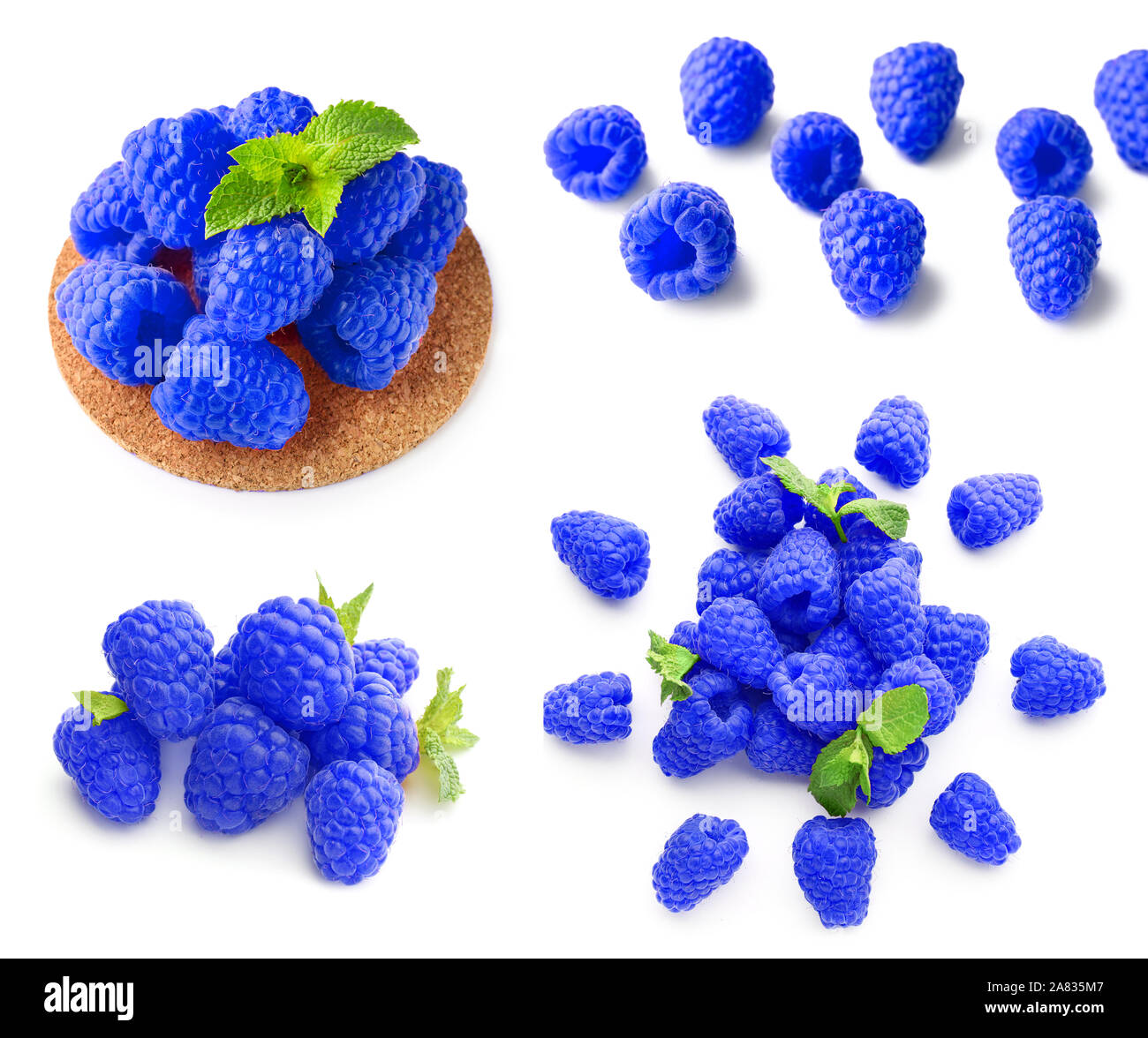 Set with fresh blue raspberry on white background Stock Photo - Alamy