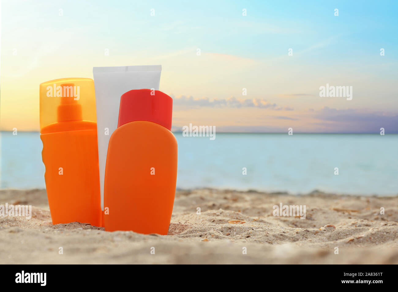 Sunscreen cream on beach sand Stock Photo - Alamy