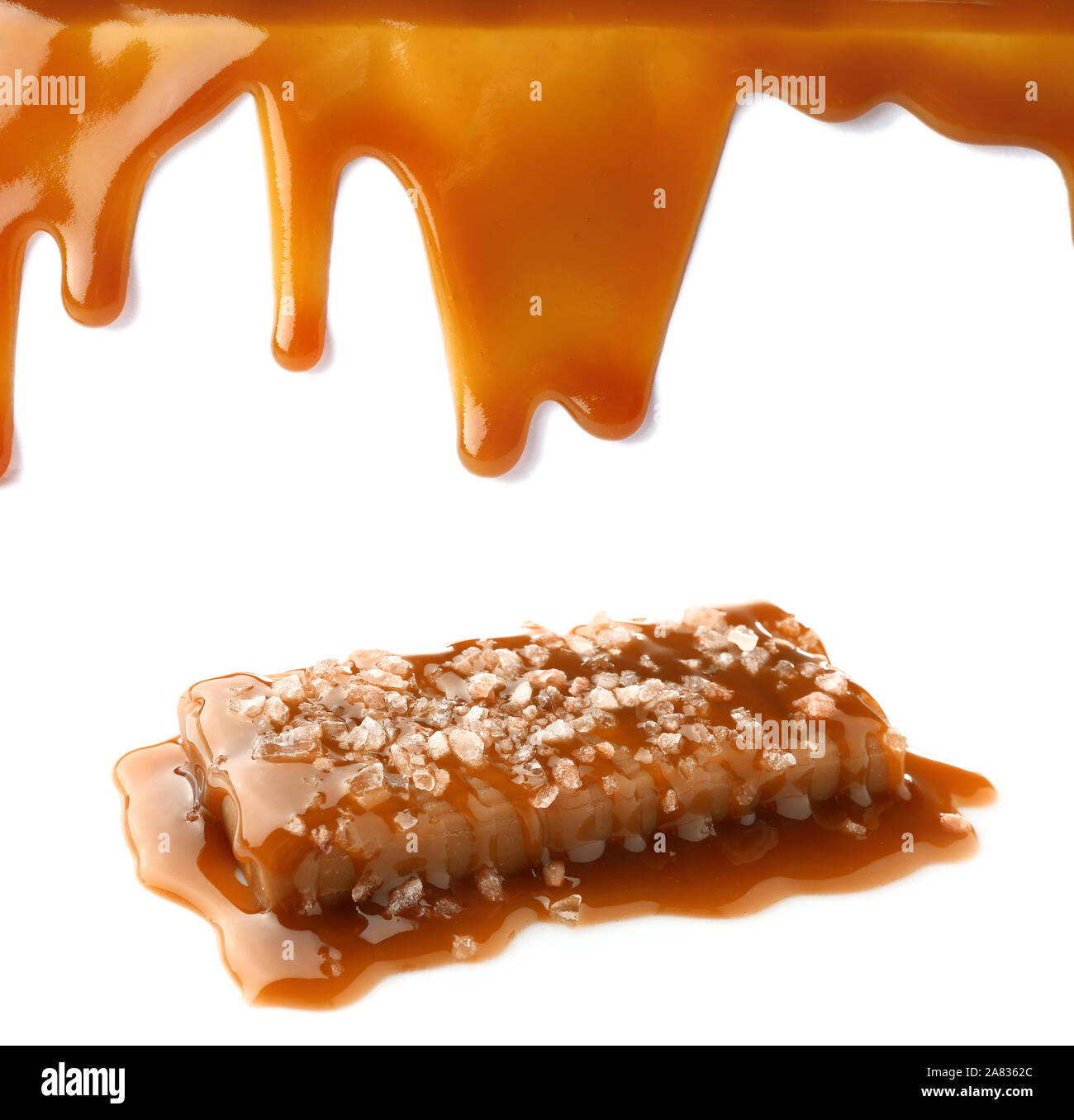 Tasty caramel on white background Stock Photo - Alamy