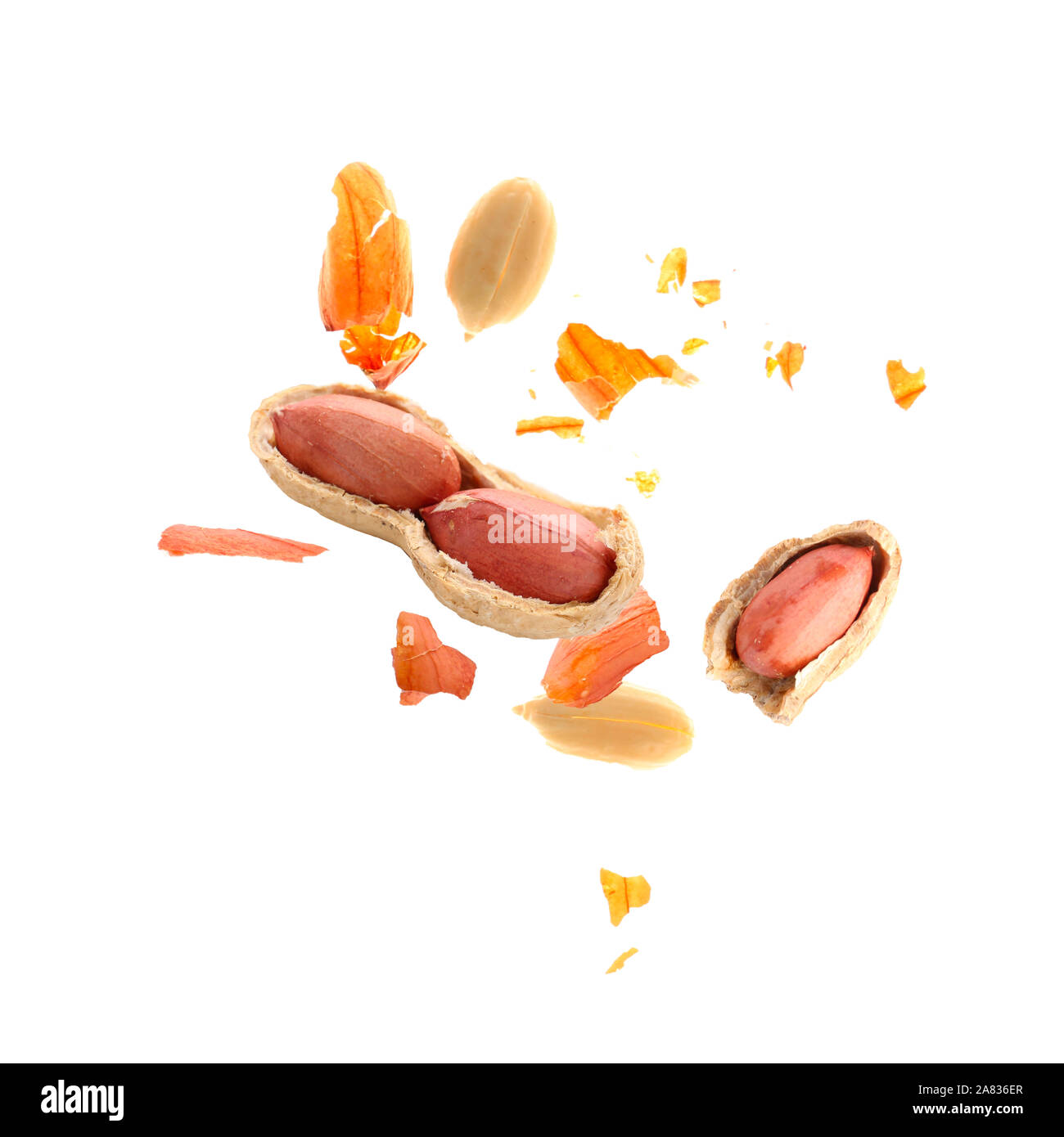 Falling peanuts on white background Stock Photo - Alamy