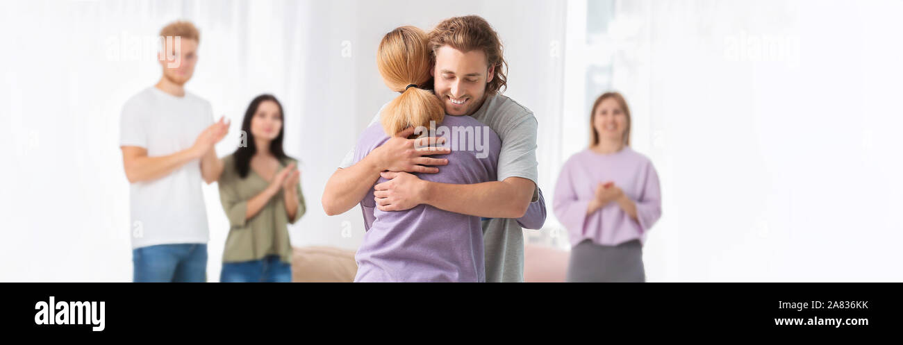 People hugging at group therapy session Stock Photo - Alamy