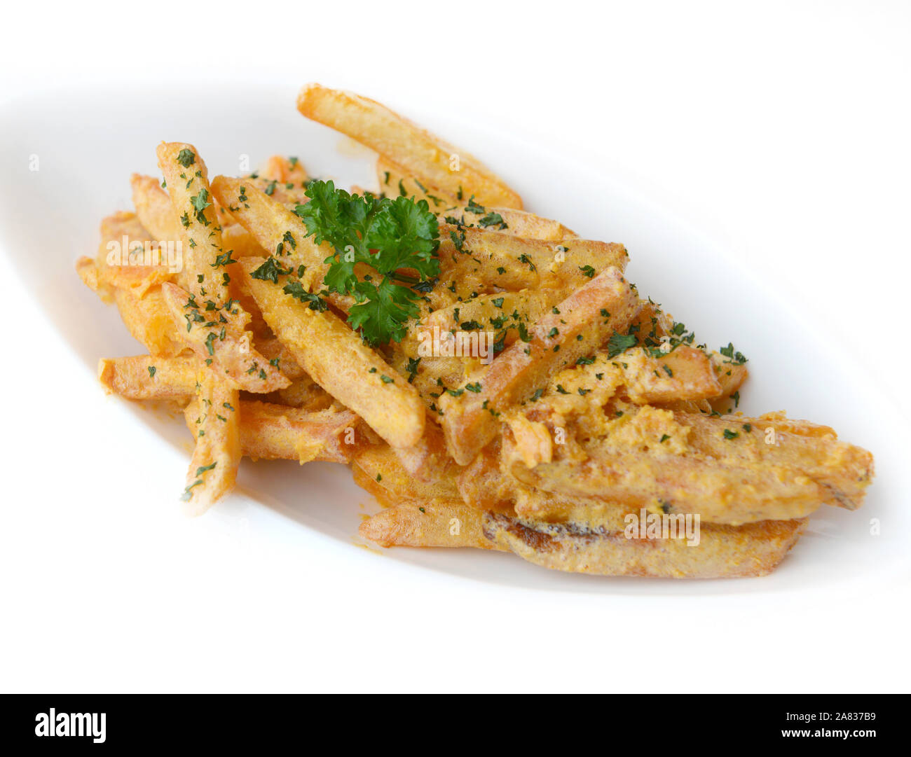 French fries seasoned with Salted Egg on the white plate on white ...