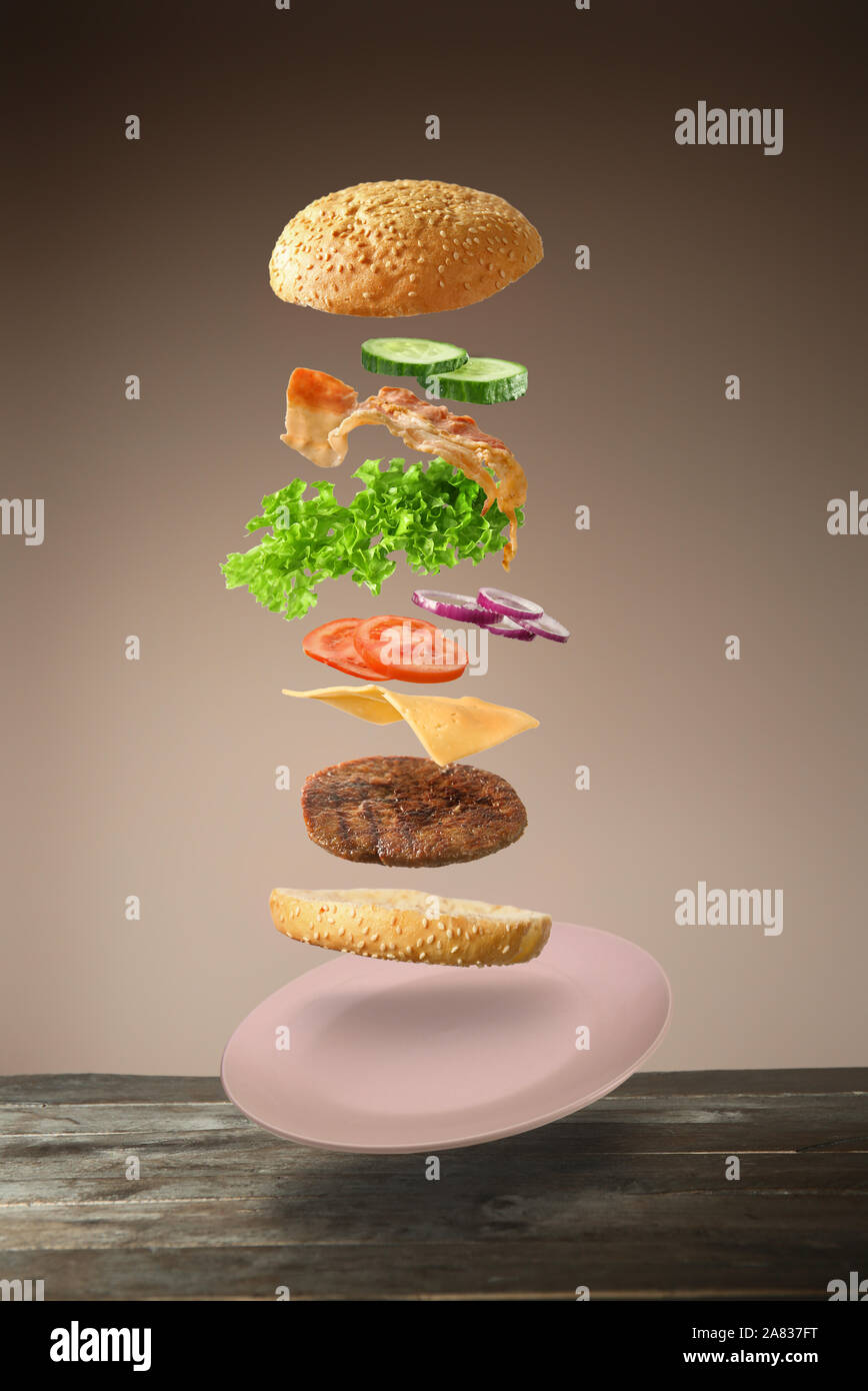 Sandwich floating ingredients burger hi-res stock photography and ...
