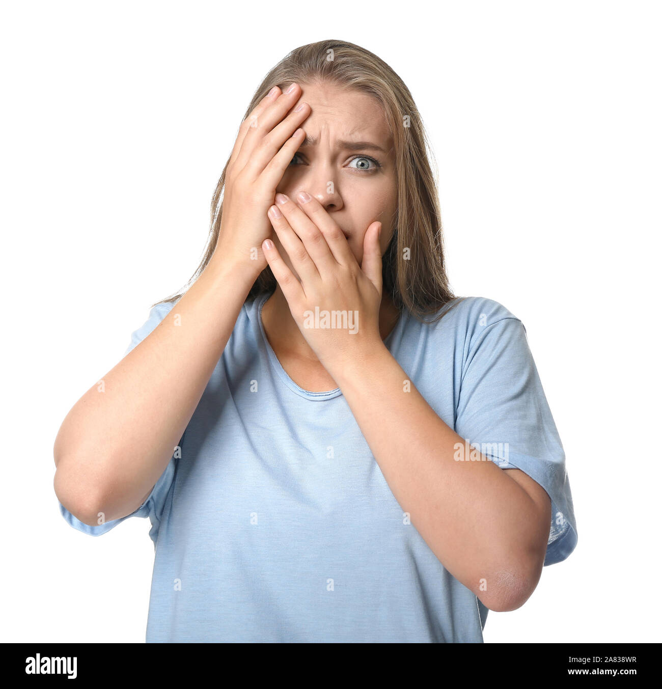Woman having panic attack on white background Stock Photo - Alamy