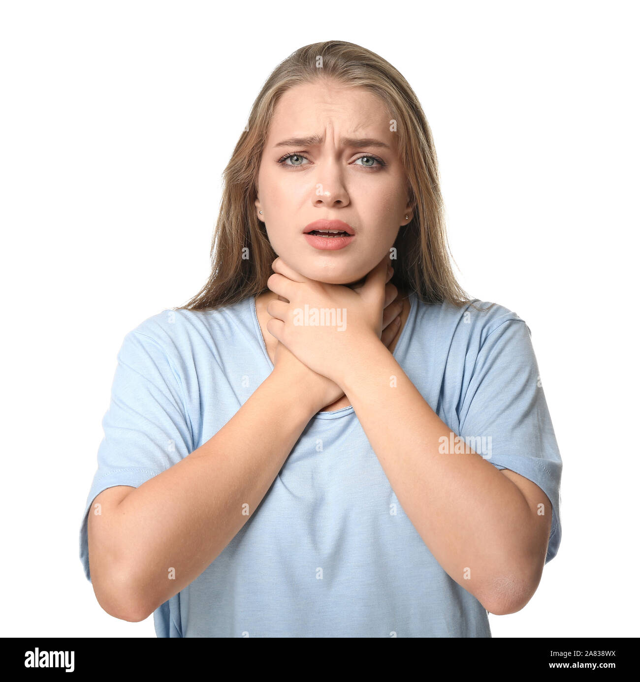 Woman having panic attack on white background Stock Photo - Alamy