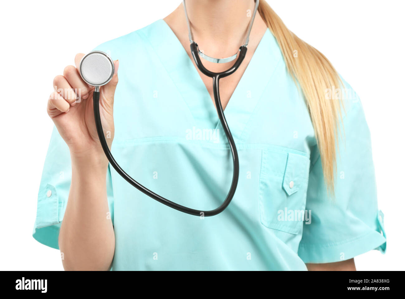 Female nurse with stethoscope on white background, closeup Stock Photo ...