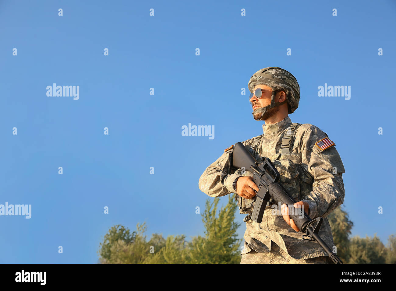 Camouflage assault rifle hi-res stock photography and images - Alamy