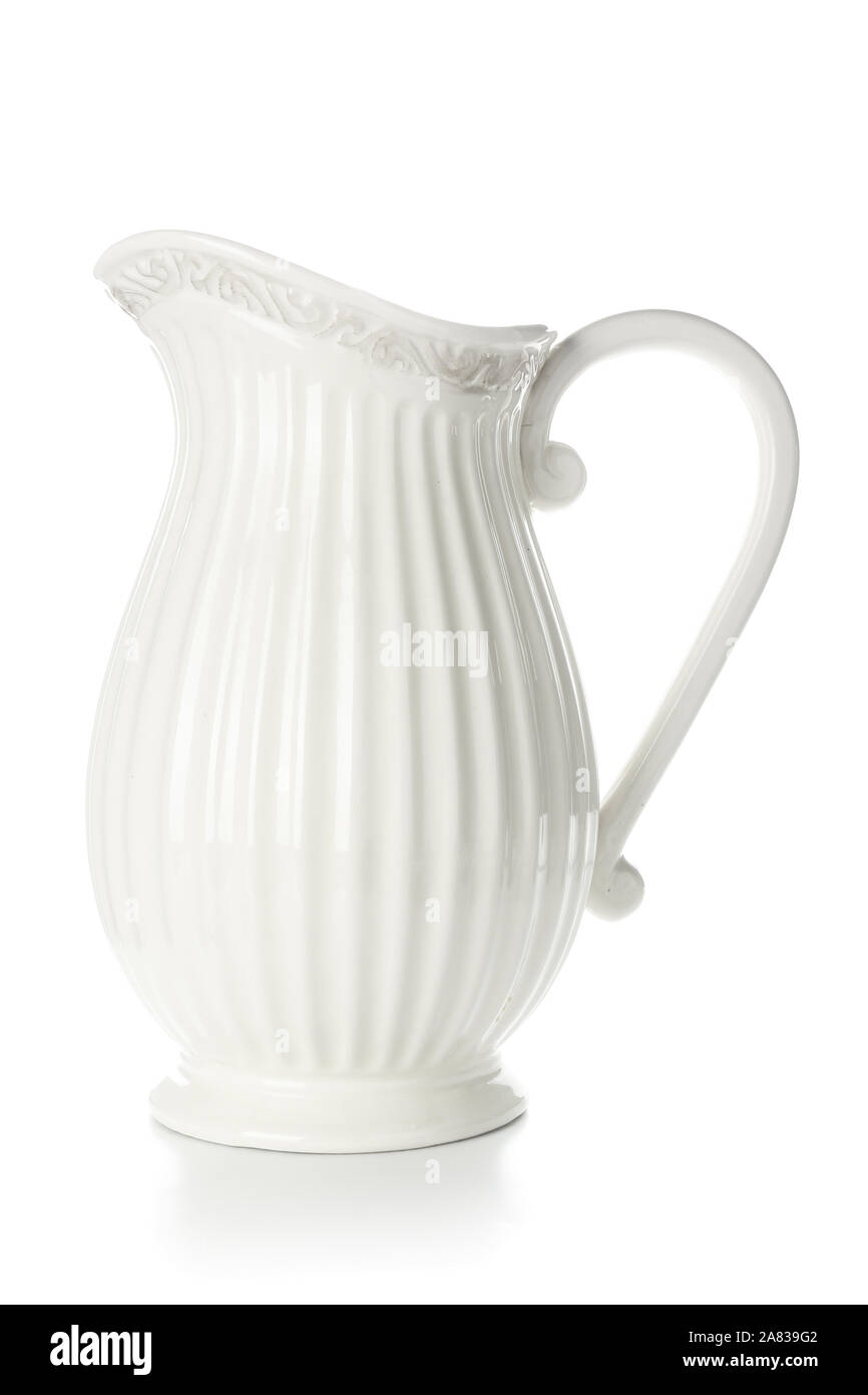 Ceramic jug on white background Stock Photo - Alamy
