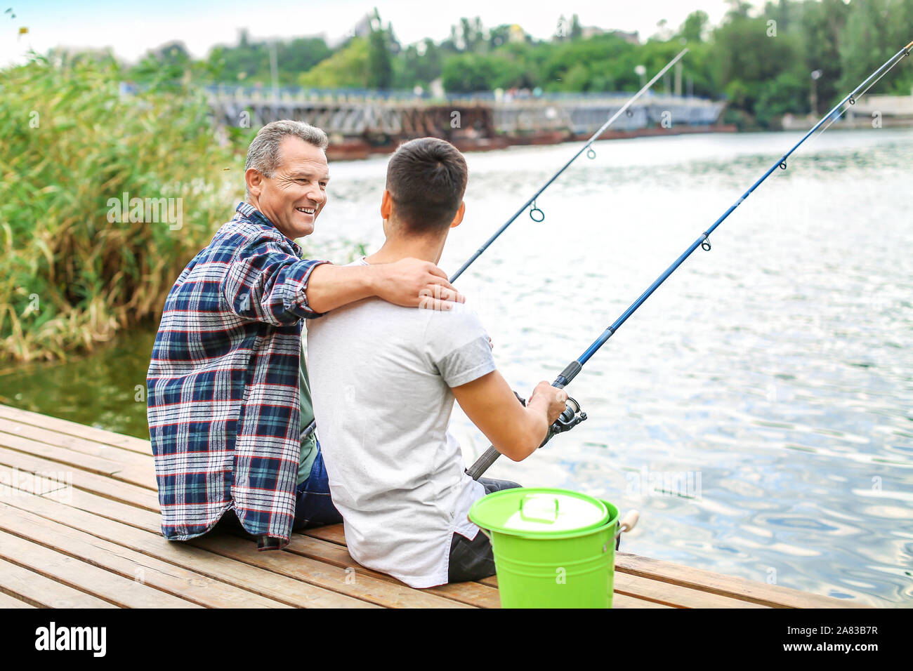 Man hugging fish hi-res stock photography and images - Alamy