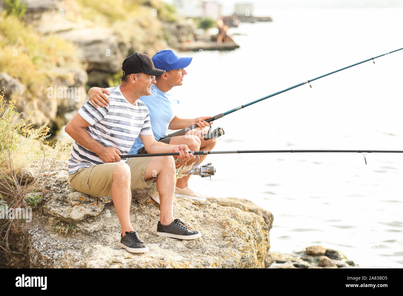 Man hugging fish hi-res stock photography and images - Alamy