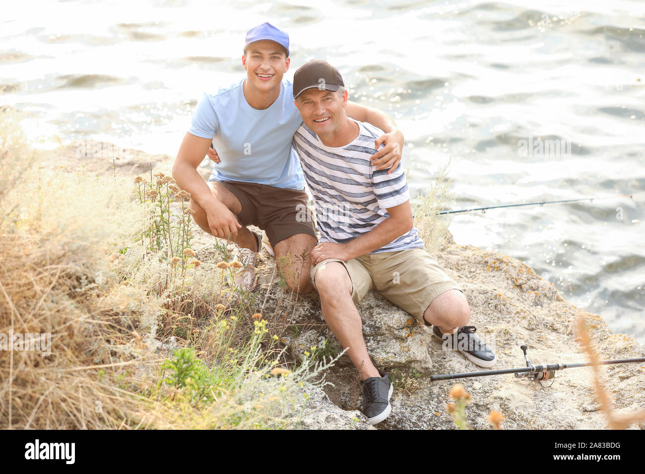 Man hugging fish hi-res stock photography and images - Alamy