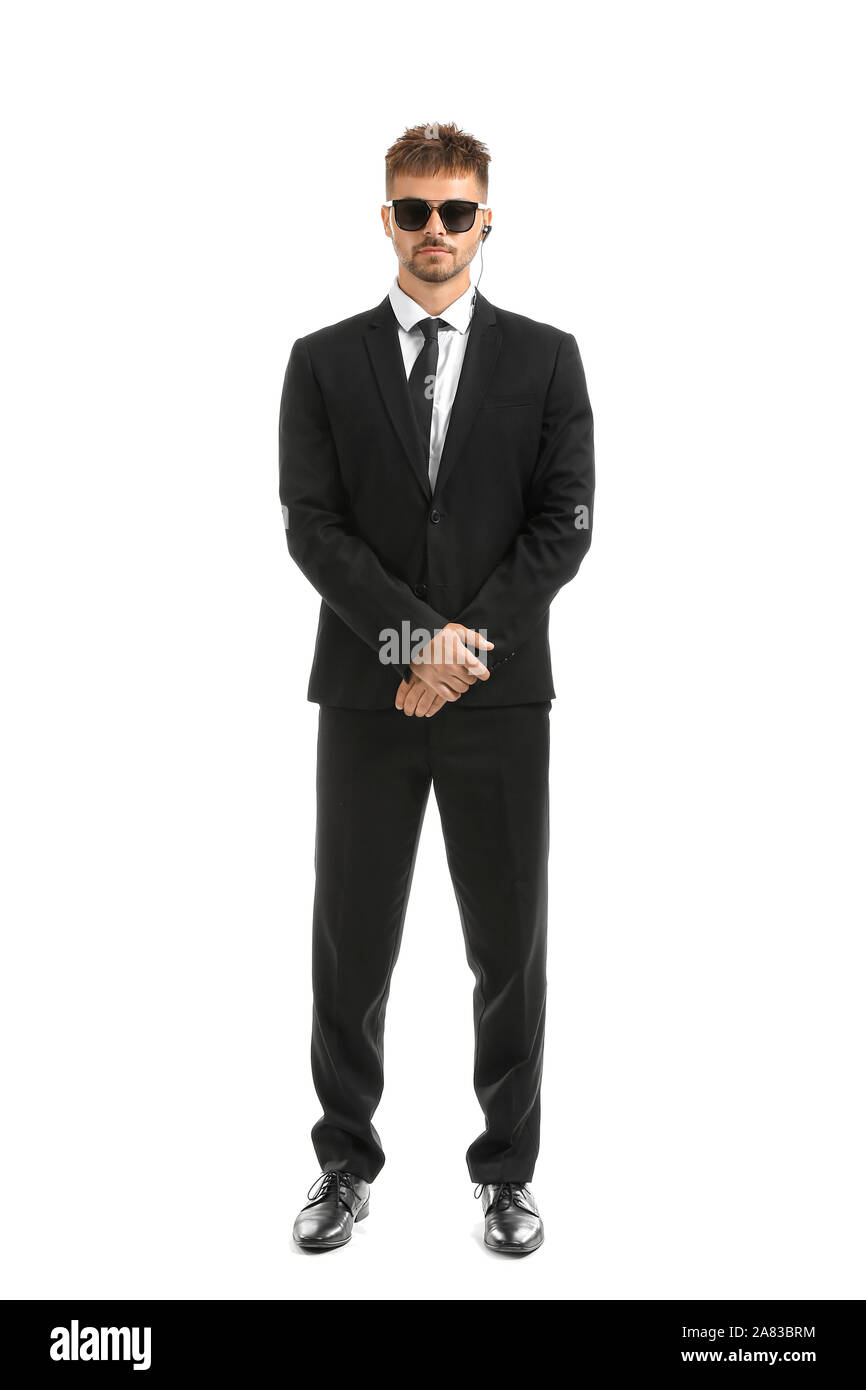 Handsome security guard on white background Stock Photo - Alamy