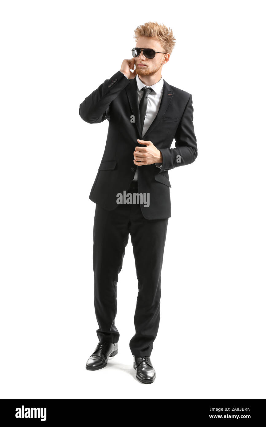 Handsome security guard on white background Stock Photo - Alamy