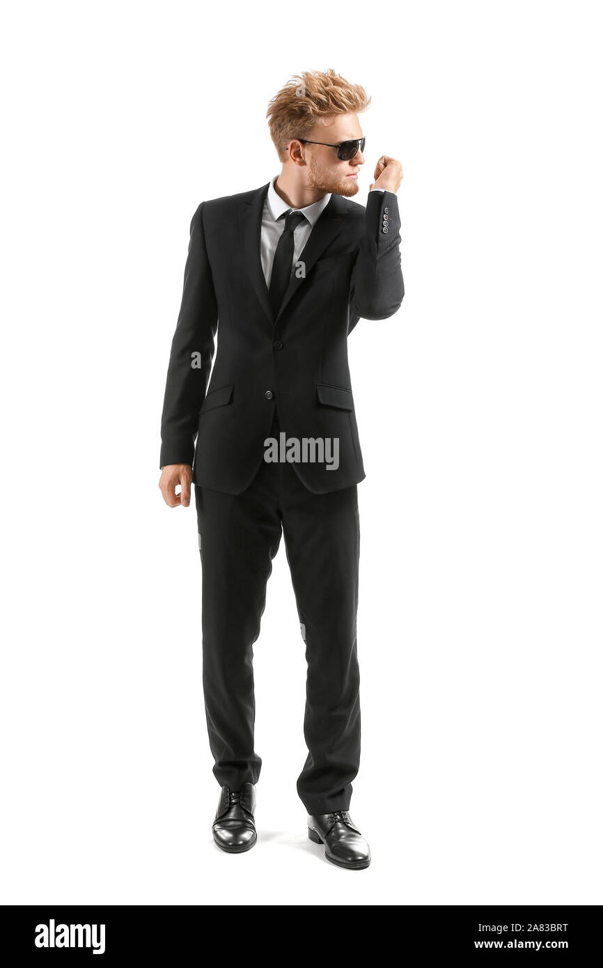 Handsome security guard on white background Stock Photo - Alamy