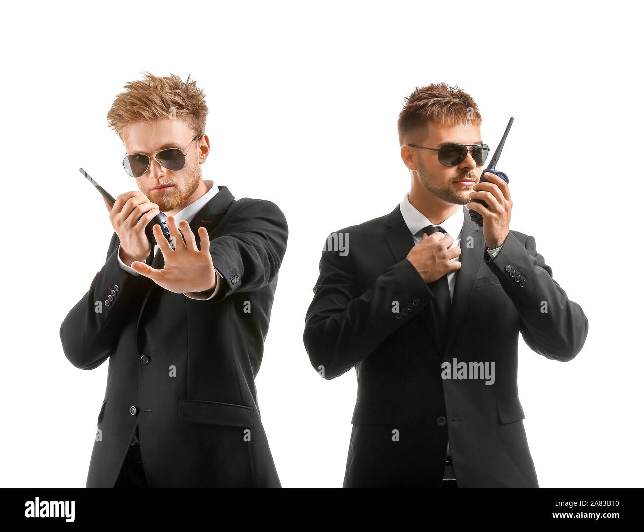 Handsome security guards on white background Stock Photo - Alamy