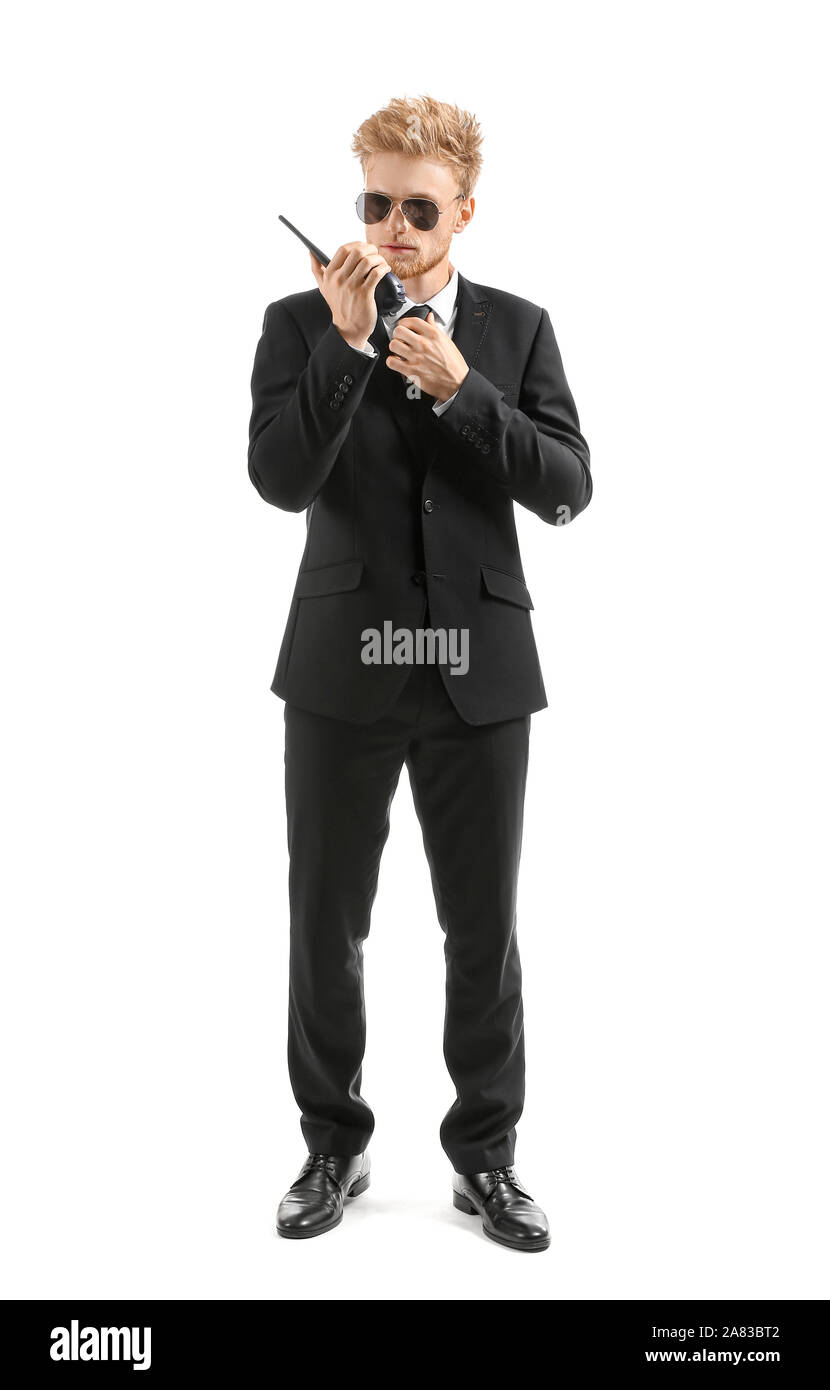 Handsome security guard on white background Stock Photo - Alamy