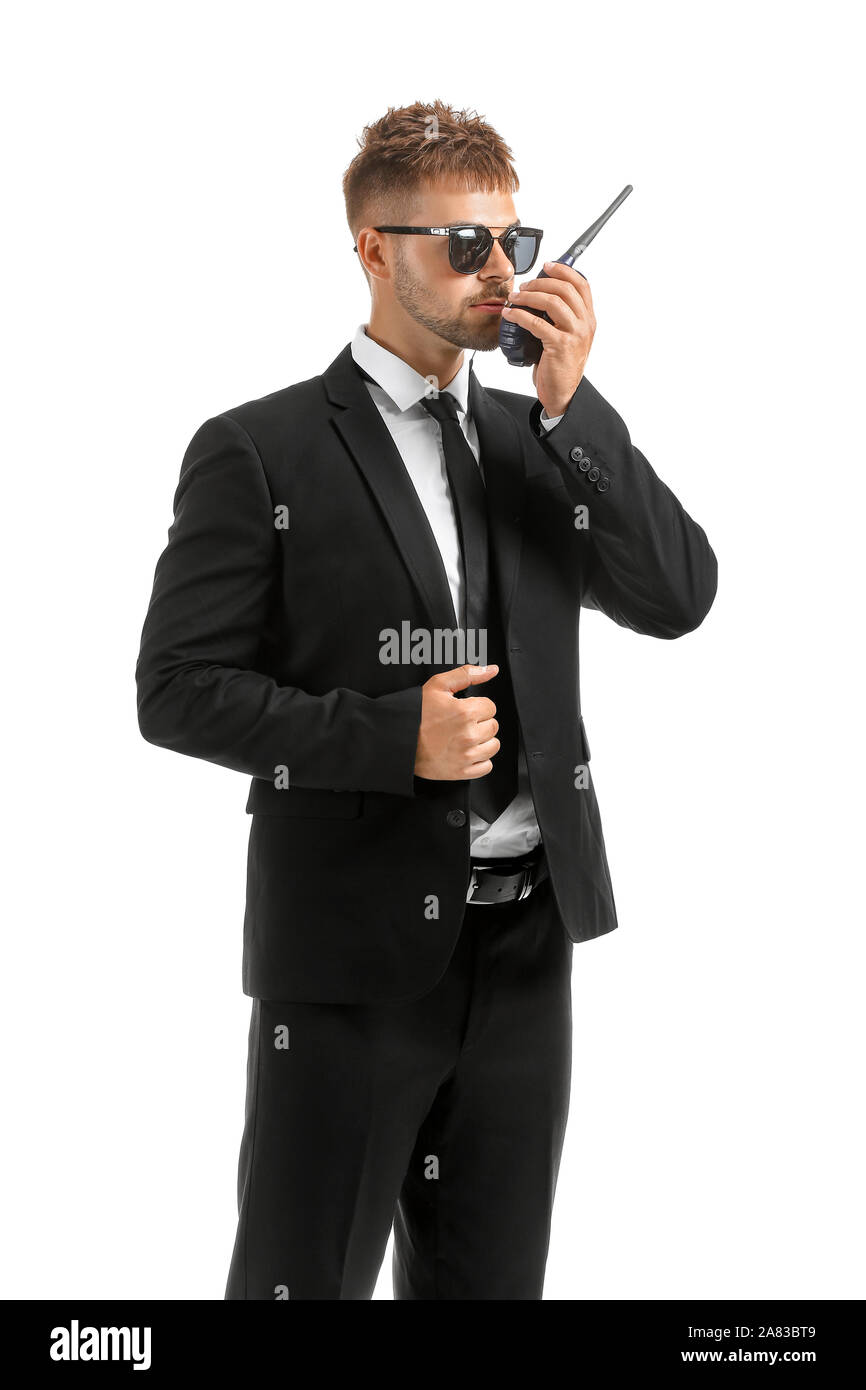 Handsome security guard on white background Stock Photo - Alamy