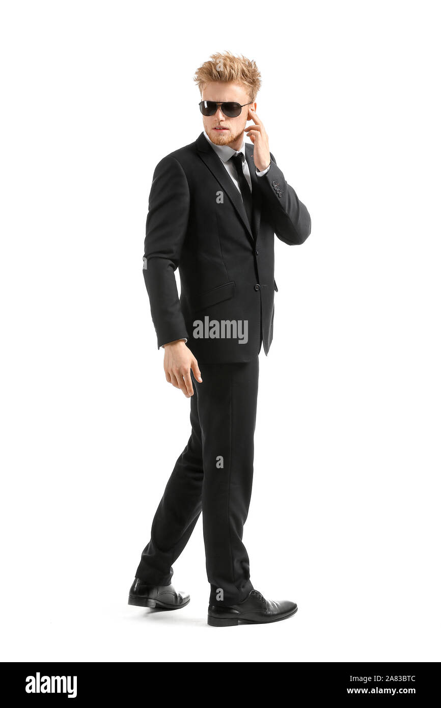 Handsome security guard on white background Stock Photo - Alamy
