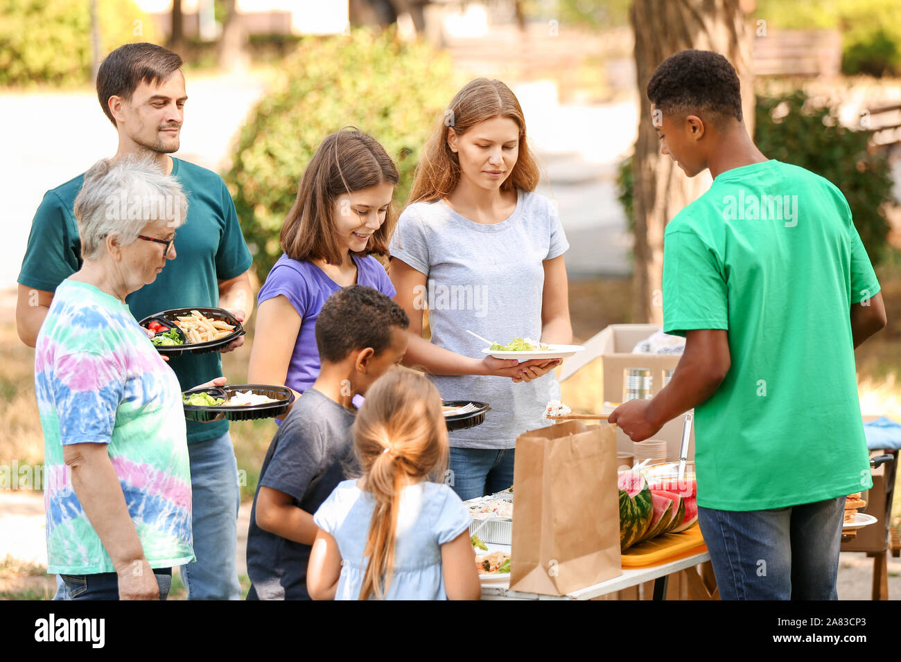 People Giving To The Poor
