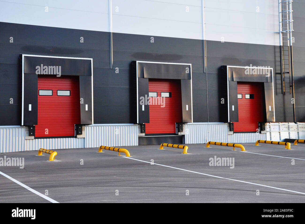 Empty loading dock of a large warehouse. Modern warehouse complex ...