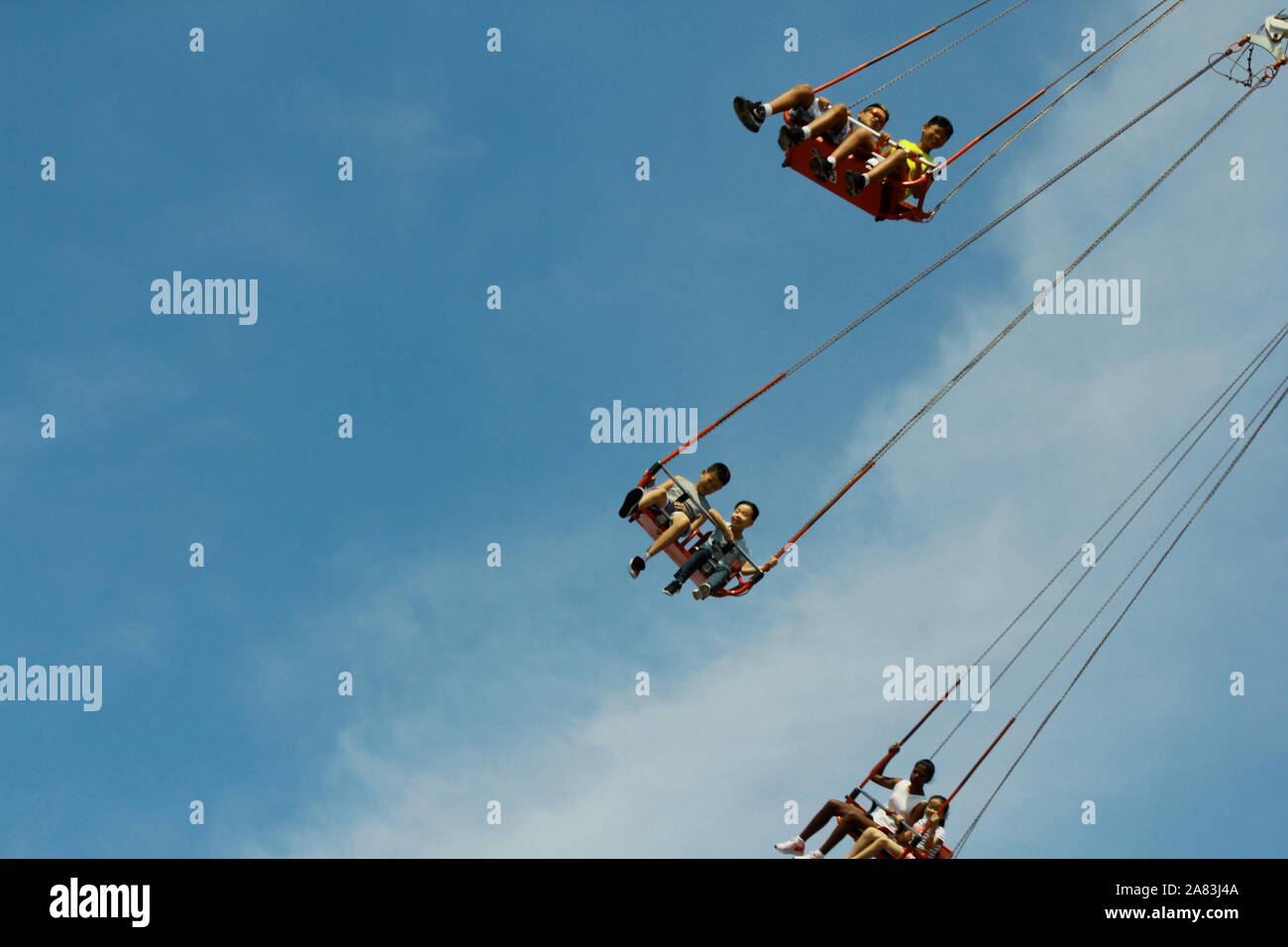 People riding Zamperla Power Surge ride in Coney Island, Brooklyn, NY ...
