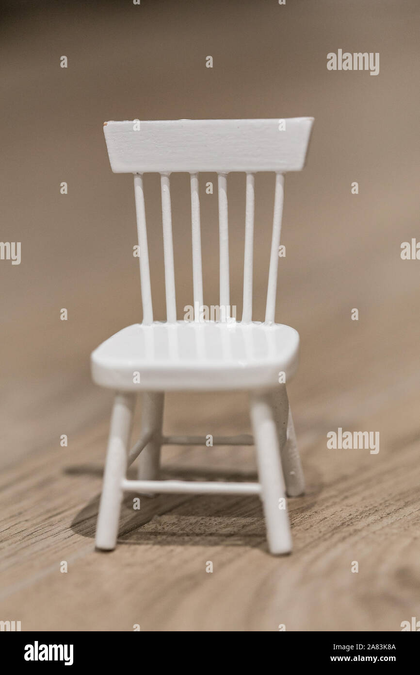 White tiny empty chair macro still Stock Photo - Alamy