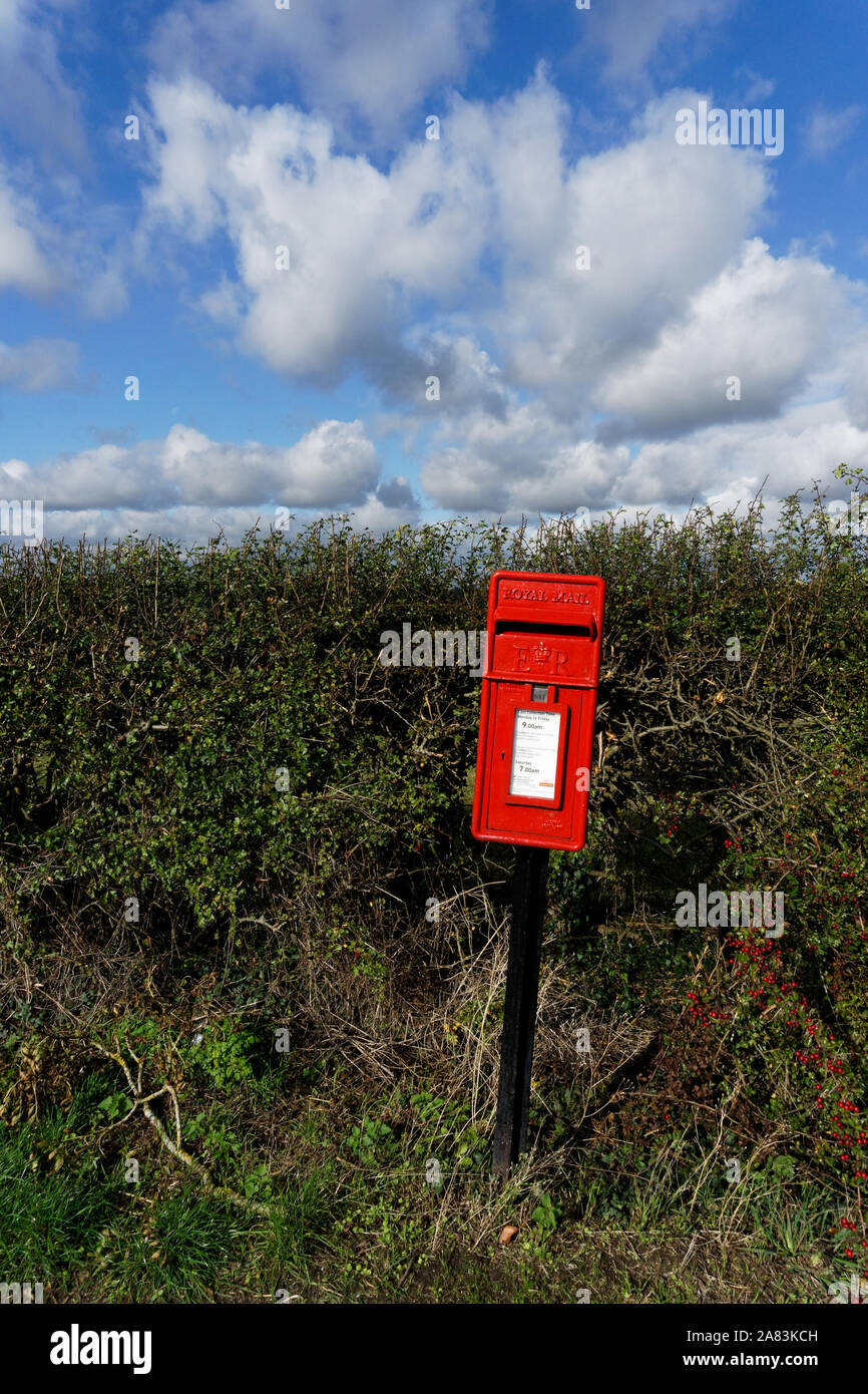 A British Royal Mail red post box in a country lane Stock Photo - Alamy