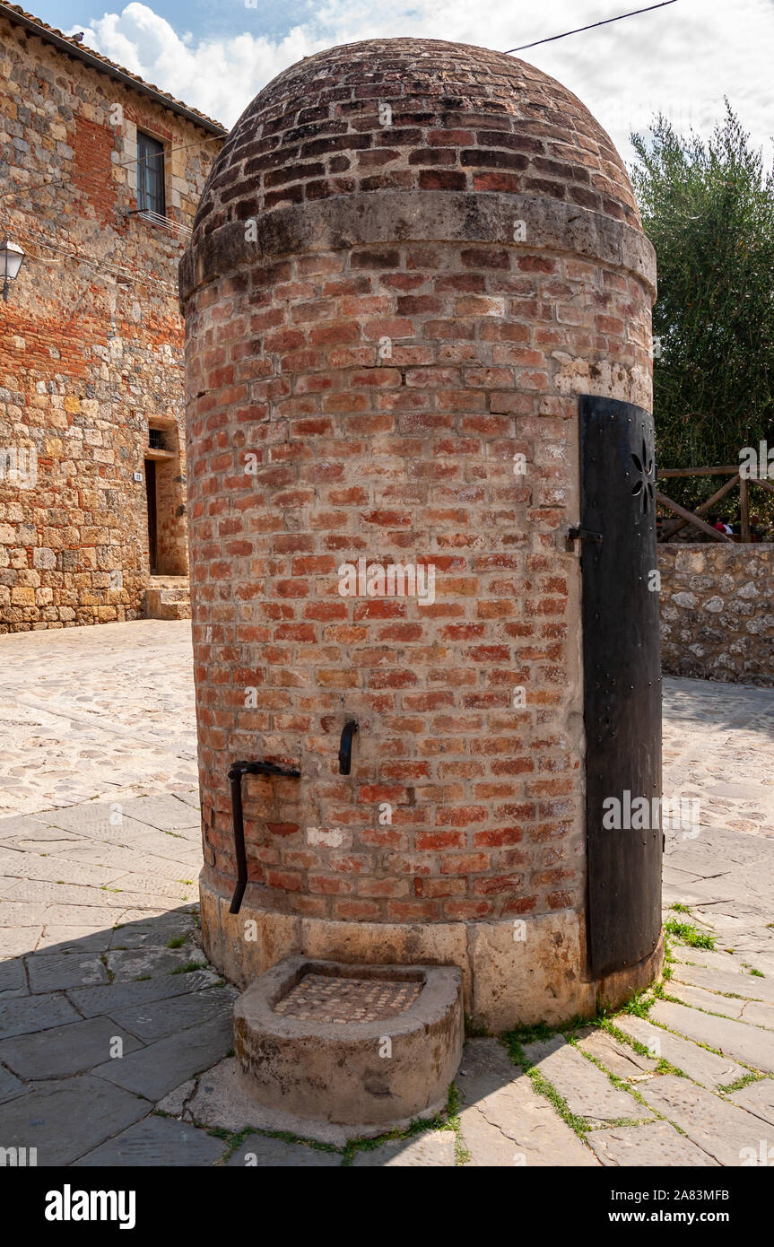 The village of Monteriggioni, Siena, Italy. View of the access to the ...