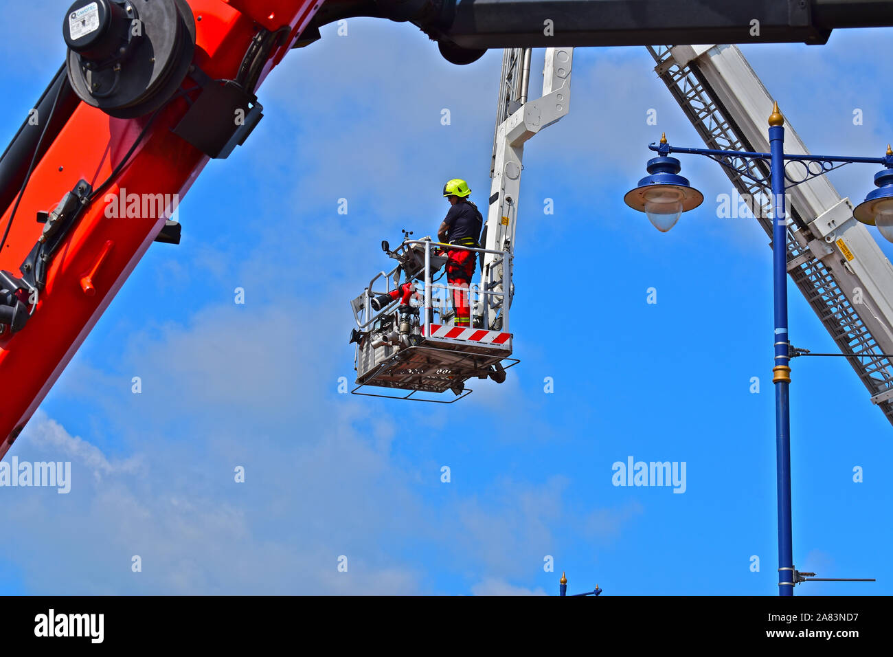 Fireman operating bronto skylift hi-res stock photography and images ...