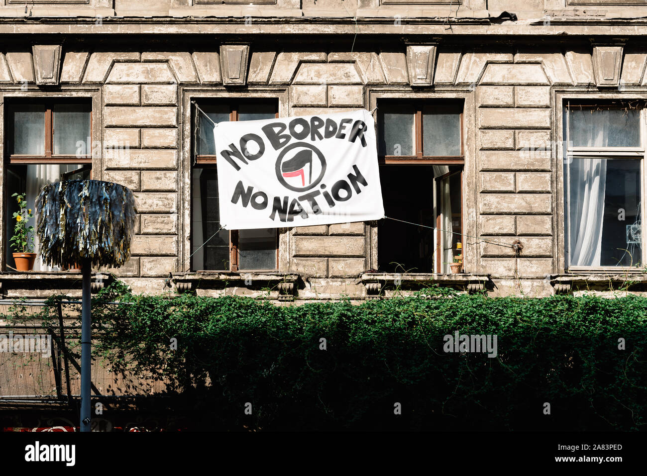 Berlin, Germany - July 28, 2019: Abandoned and occupied building with ...