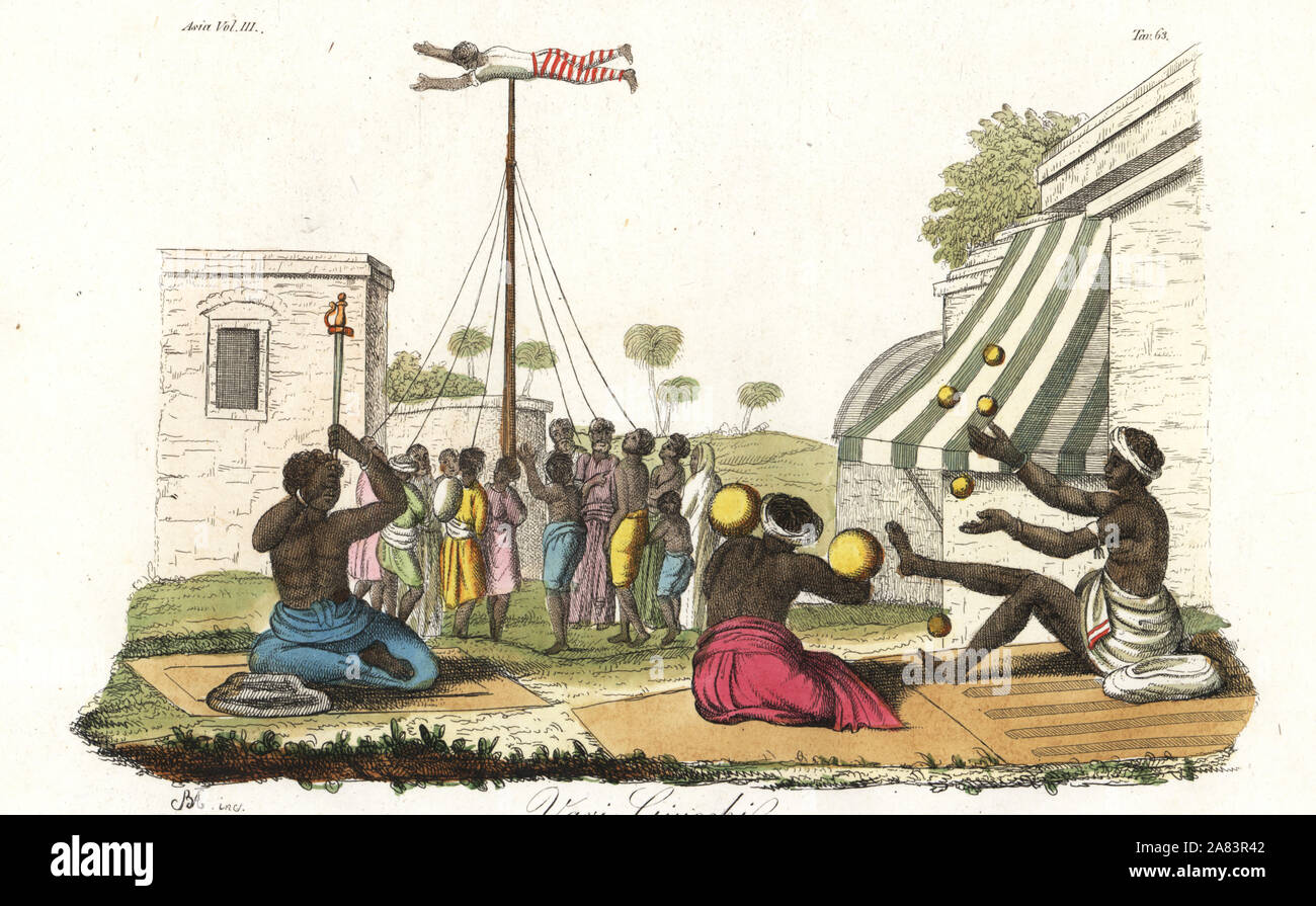 Indian street entertainers including a sword swallower, jugglers and ...