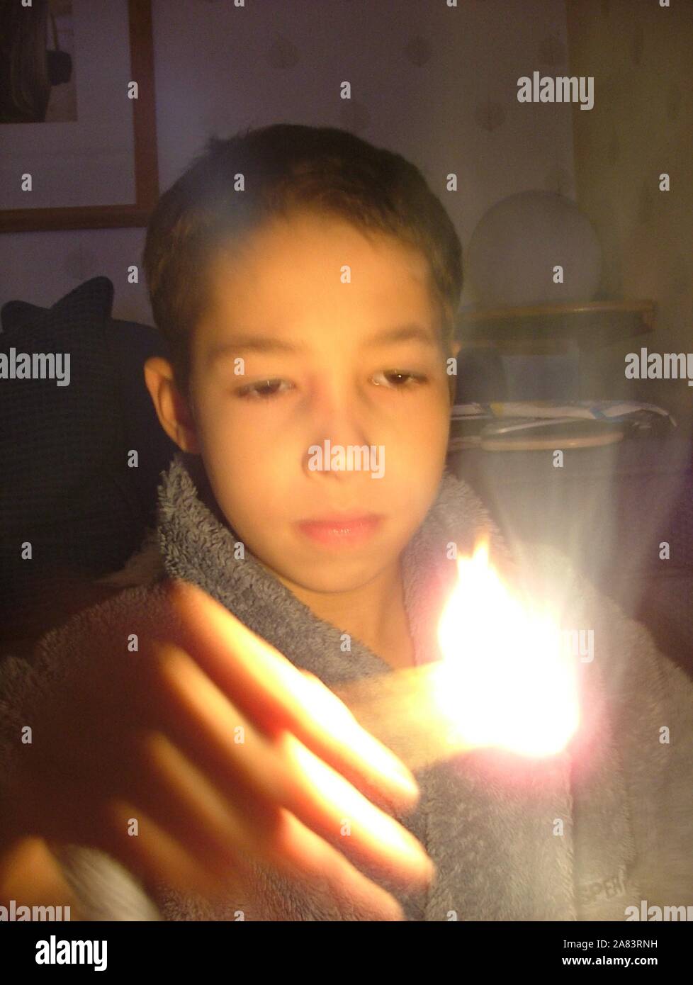 Boy Playing With Fire High Resolution Stock Photography and Images - Alamy